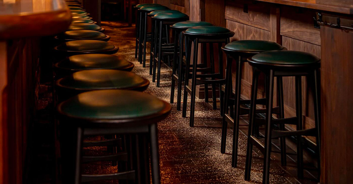 Blood, Spit, and Beers: Why Bars Put Sawdust on Their Floors | VinePair