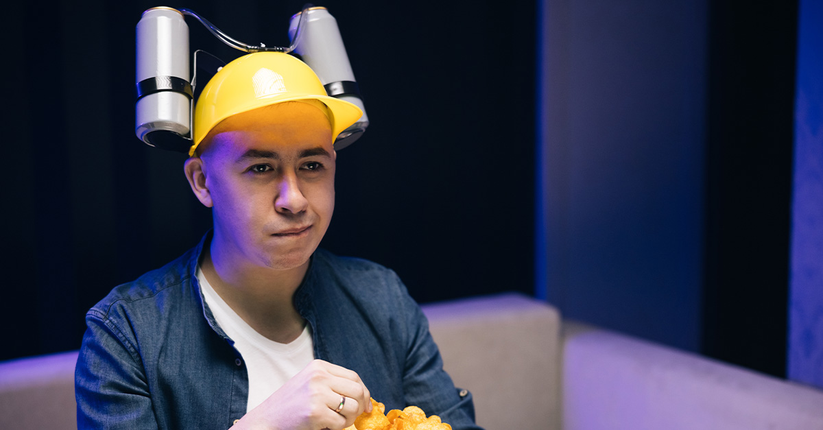 Yuppies, Sports, and Suds: The Boozy History of the Beer Helmet | VinePair